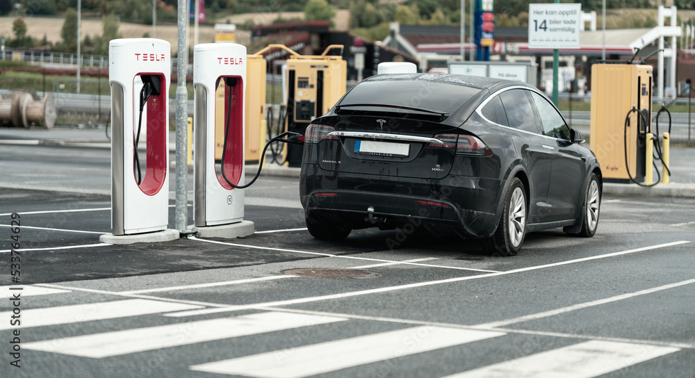 Tesla electric vehicle charging point charging tesla model x Stock ...