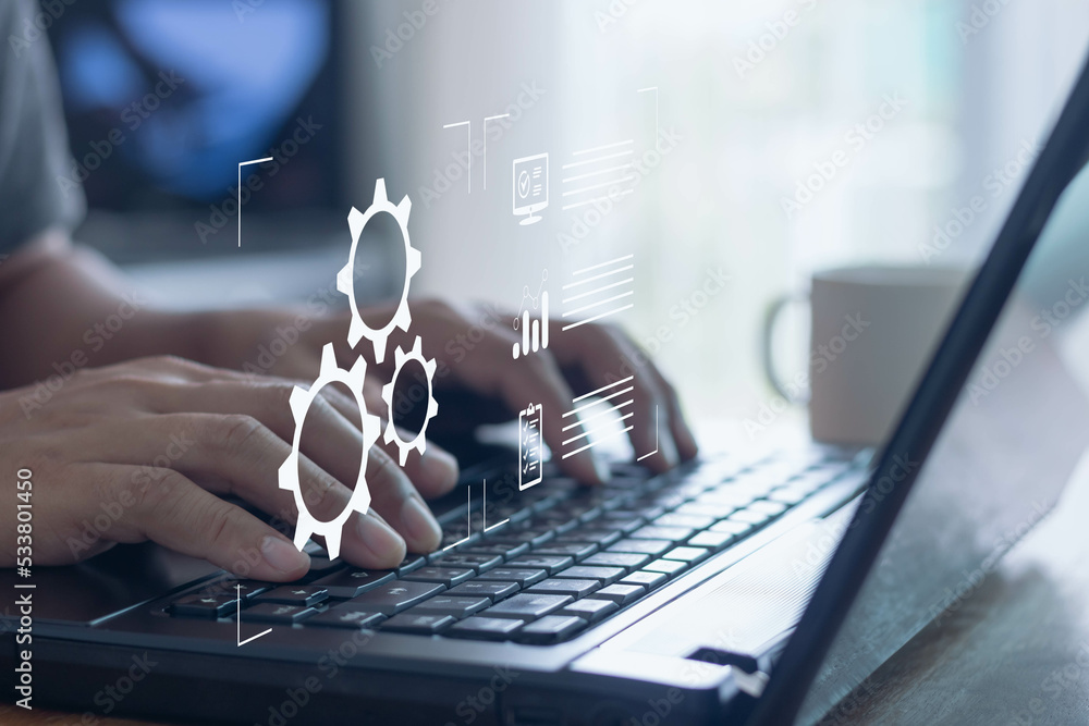 Person working on computer laptop. automation, industrial business ...