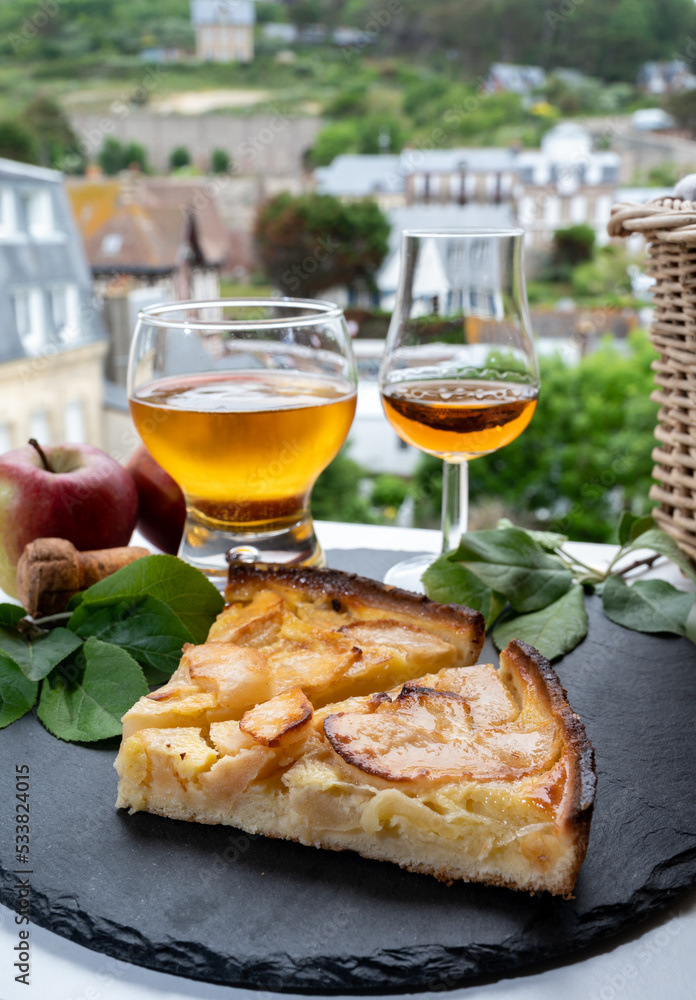 Apple products of Normandy, homemade baked apple cake, glasses of ...