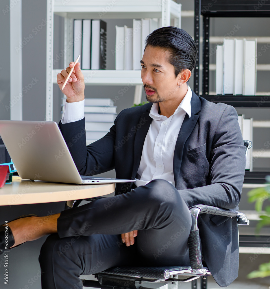 Millennial Asian professional successful thoughtful male businessman ...