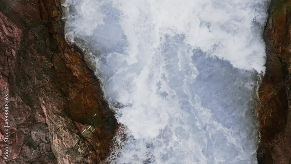 Mountain river. A rapid flow of clean water trapped between rocks ...