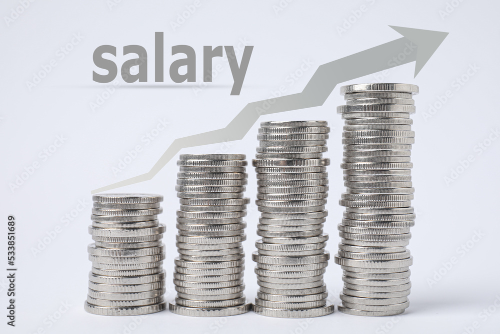 Salary increase concept. Stacked coins and illustration of up arrow on ...