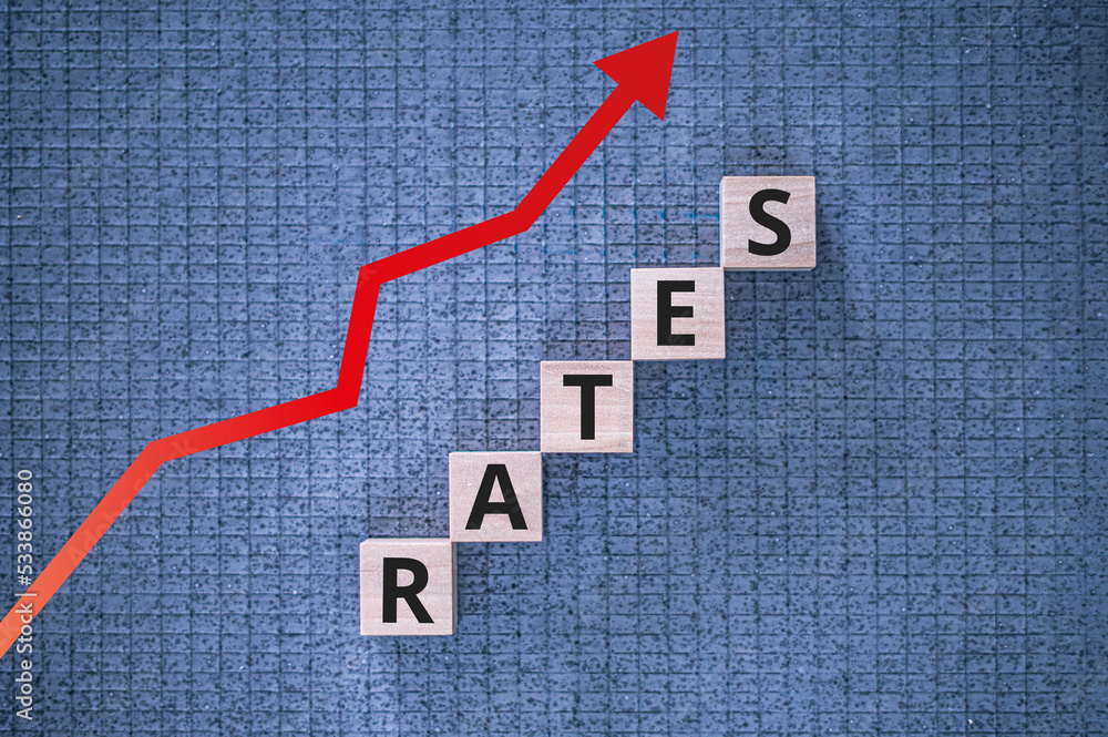 Rates on blue graph background with red arrow pointing upwards Stock ...