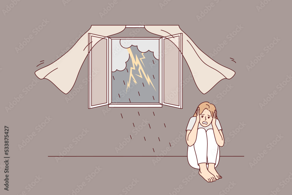Scared Girl Sitting On Floor Afraid Of Storm Outdoors Terrified Young