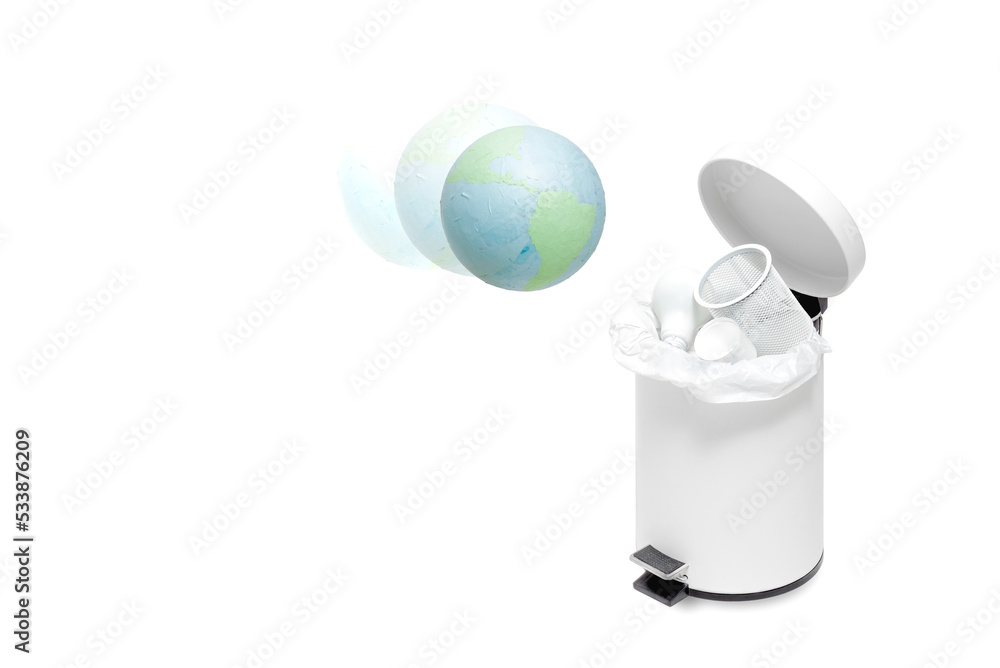 planet earth or globe of the world, thrown in the trash, on white ...