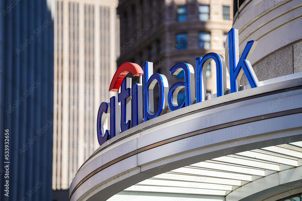 The logo sign of Citibank finance brand in front of a store from a ...