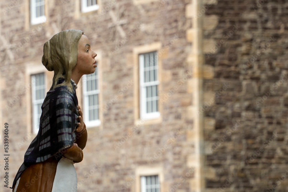 Figure of a mill spinner girl at the UNESCO World Heritage site of New ...