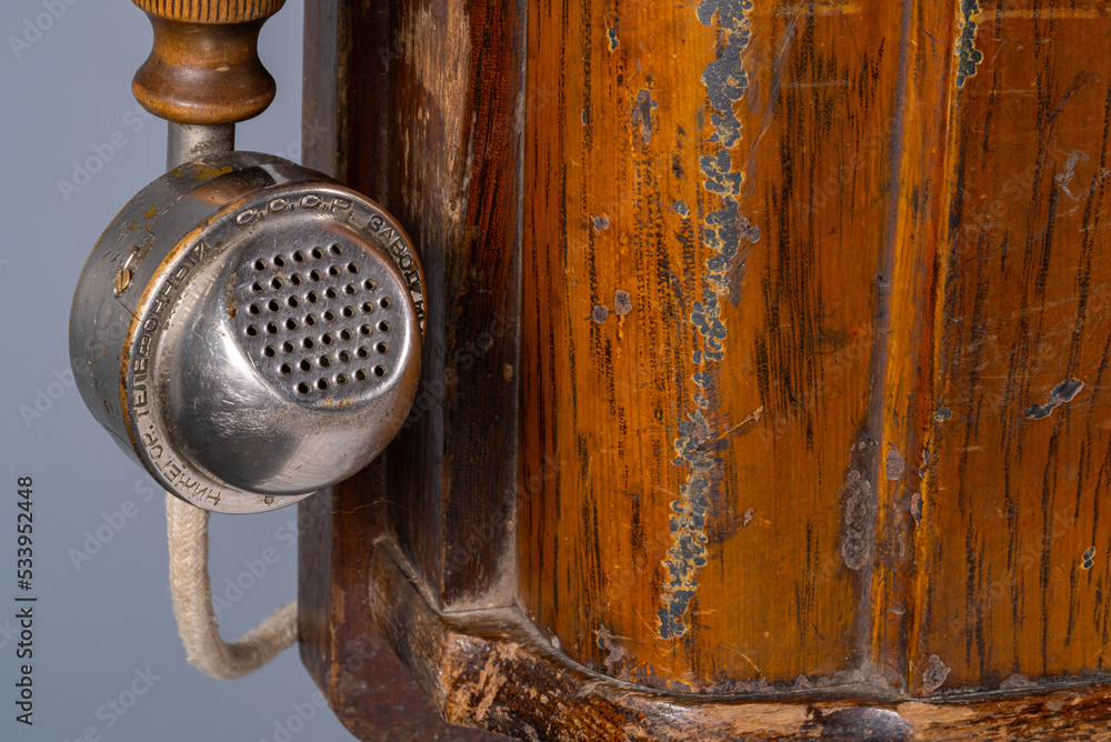 Brown wooden case of an old telephone set with receiver. Old shabby ...