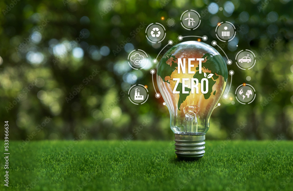 Net zero. Light bulb with icons with green background. In the Net zero concept. Zero greenhouse ...