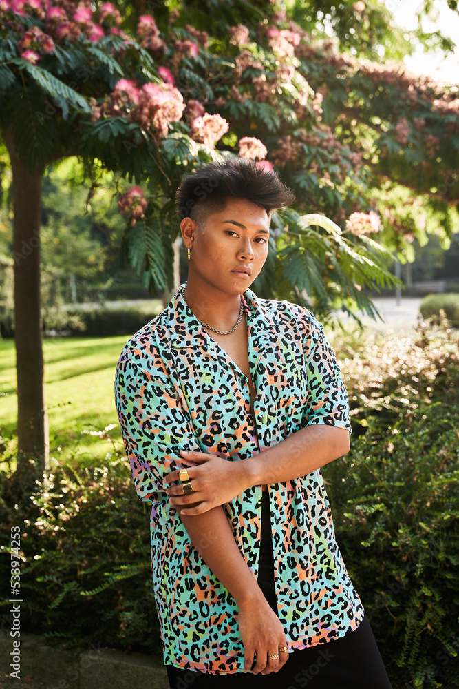 Stylish Filipino transgender woman in park Stock Photo | Adobe Stock