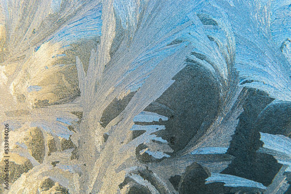 Frozen winter window with shiny ice frost pattern texture. Christmas ...