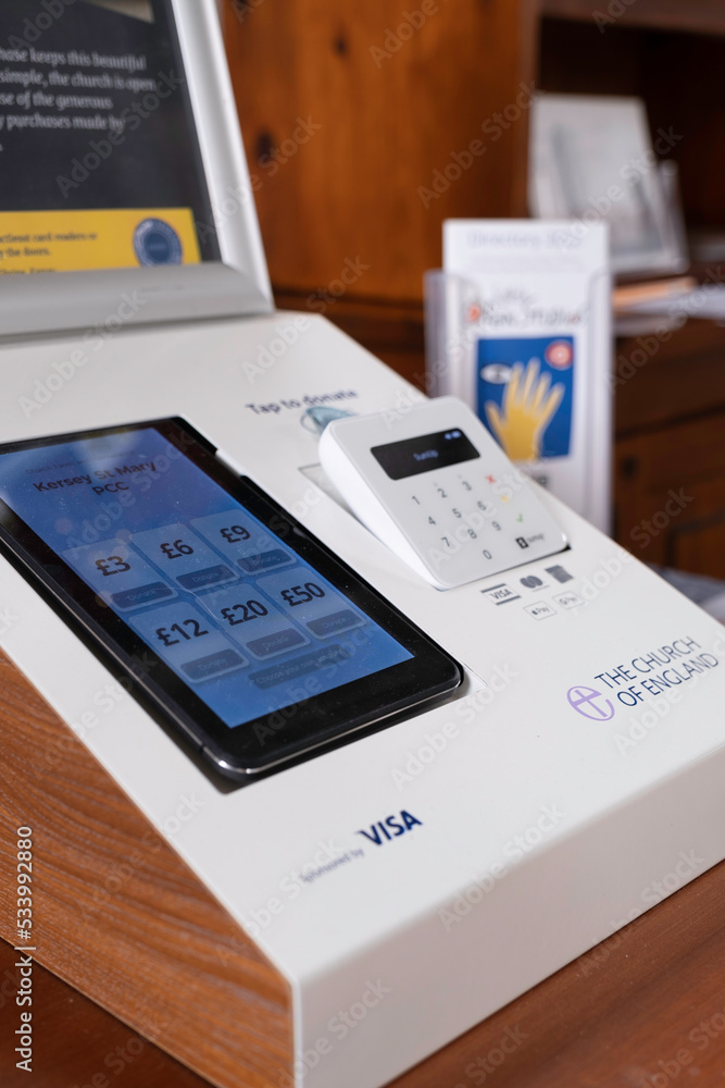 KERSEY, UK - SEPTEMBER 12 2022: Contactless device to donate digitally ...