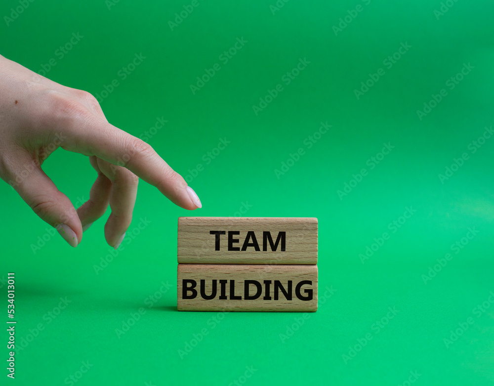 Team Building symbol. Concept word Team Building on wooden blocks ...