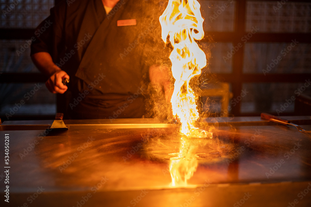 Flame on a hibachi grill Stock Photo | Adobe Stock