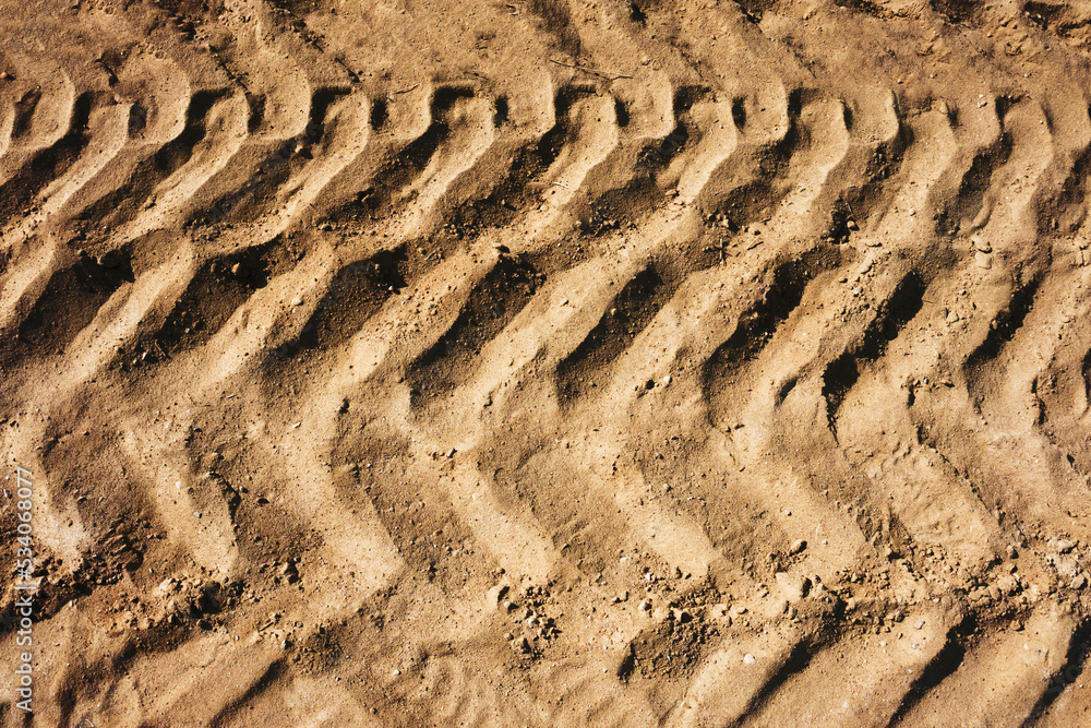Tyre mark background. Tire track shape. Trail lines on dry brown sand ...