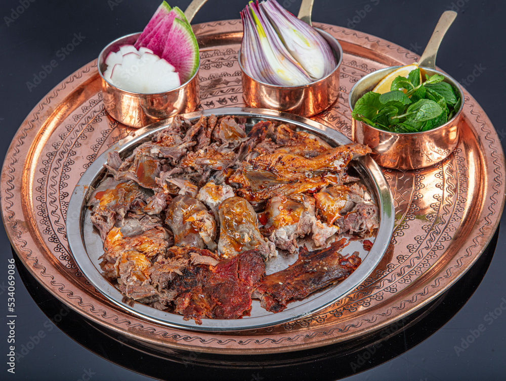 Turkey national cuisine dish Roasting lamb with meat. Roasted head of ...