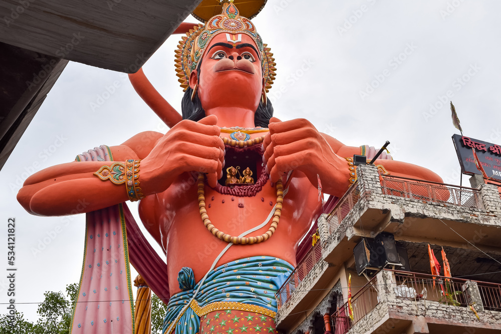 Big statue of Lord Hanuman near the delhi metro bridge situated near ...