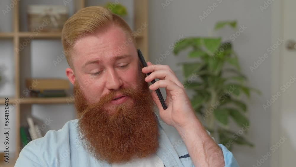 Head Shot Young Redhead Man Involved In Mobile Phone Conversation Stock