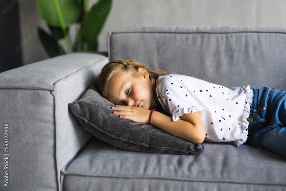 Sweet dreams. Cute little preteen girl sleep dream nap on cozy couch ...