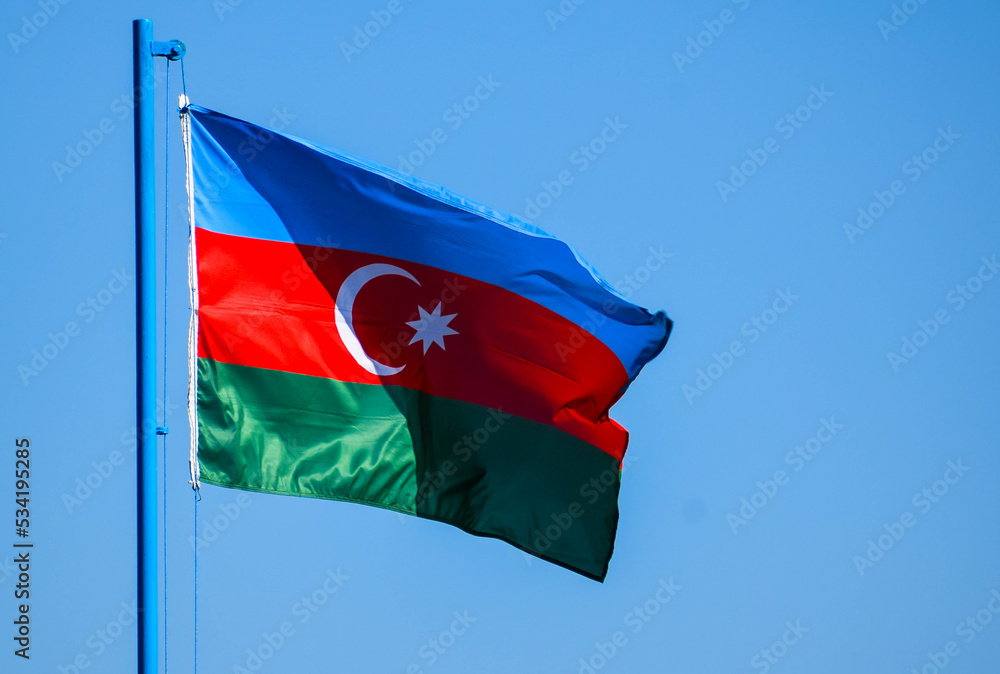 The flag of Azerbaijan consists of three equal horizontal stripes ...