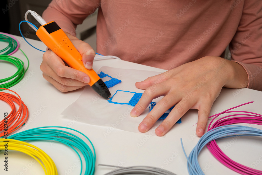 Teen Girl Using 3d Pen. Printing with Colored Plastic Wire Filament ...