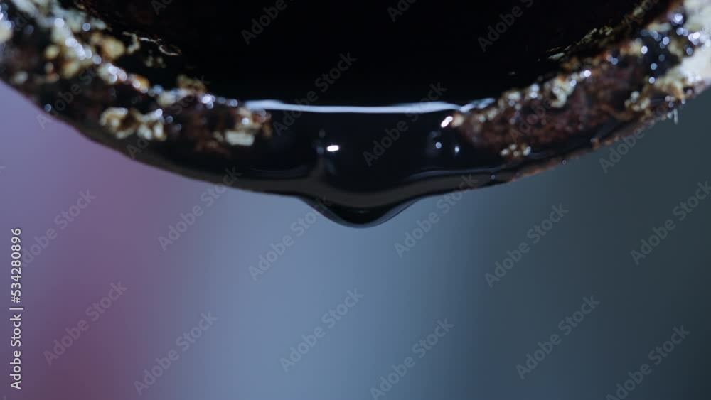 Crude black Brent oil pipeline pouring close up background with man ...