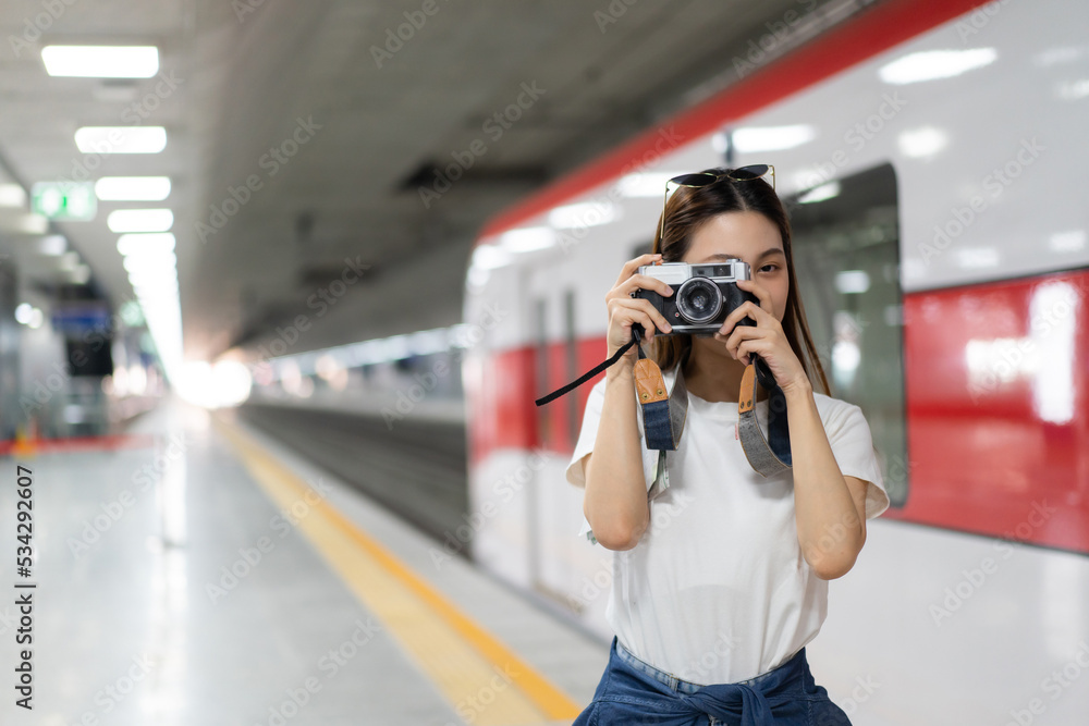 Selective focus, half-body image of a young beautiful Asian woman ...