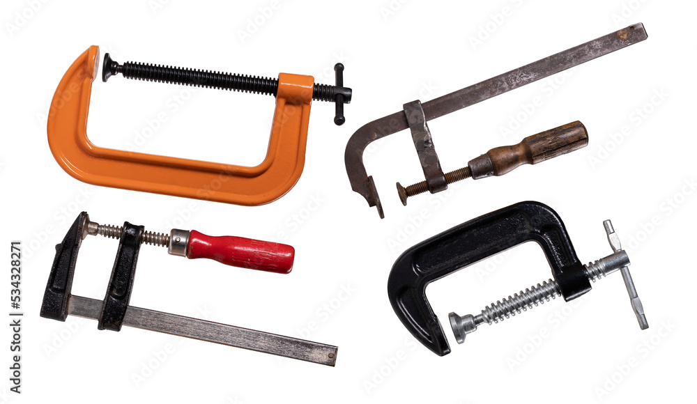 Four different clamps for joining wood on an isolated background. Stock ...