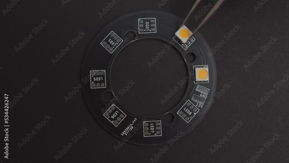 Manually Placing Electronics Components on Black PCB Top View Stock ... Manually Placing Electronics Components on Black PCB Top View Stock ...