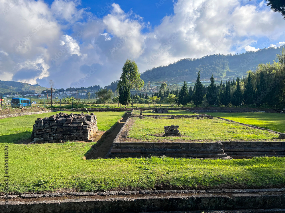 Local tourists visit Arjuna temple complex at Dieng Plateau. Stock ...