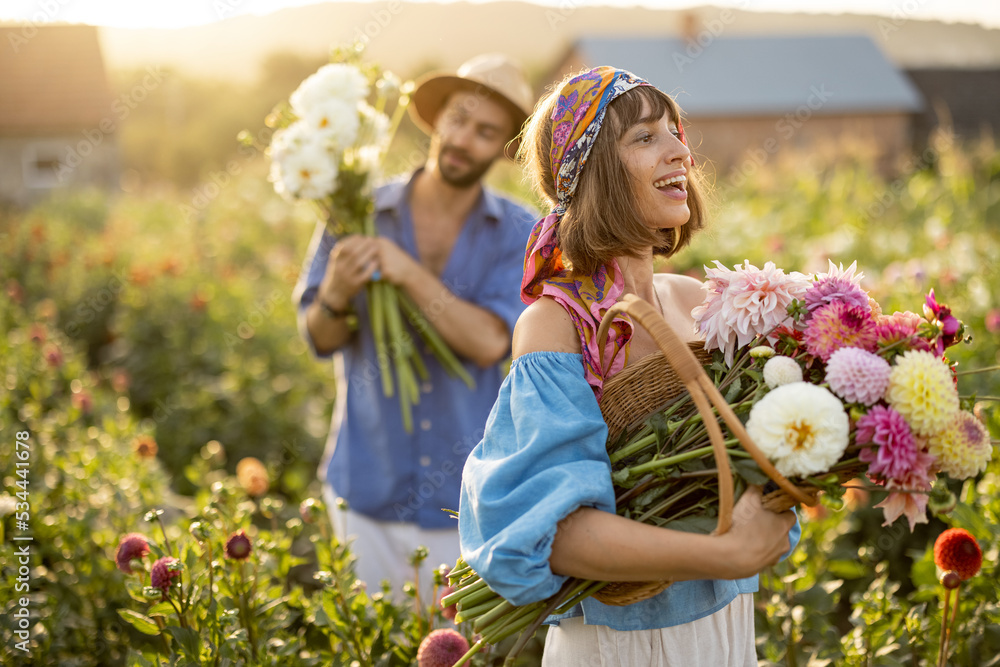 Portrait of a beautiful and cheerful woman as a farmer or gardener ...