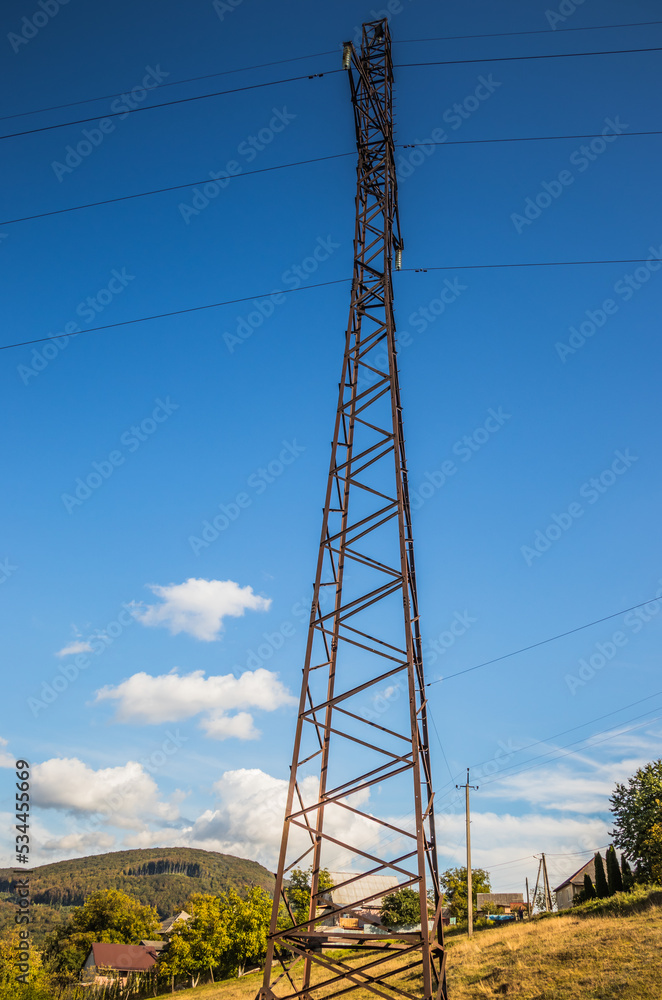 High voltage, power transmission line on the mountain range. Overhead ...
