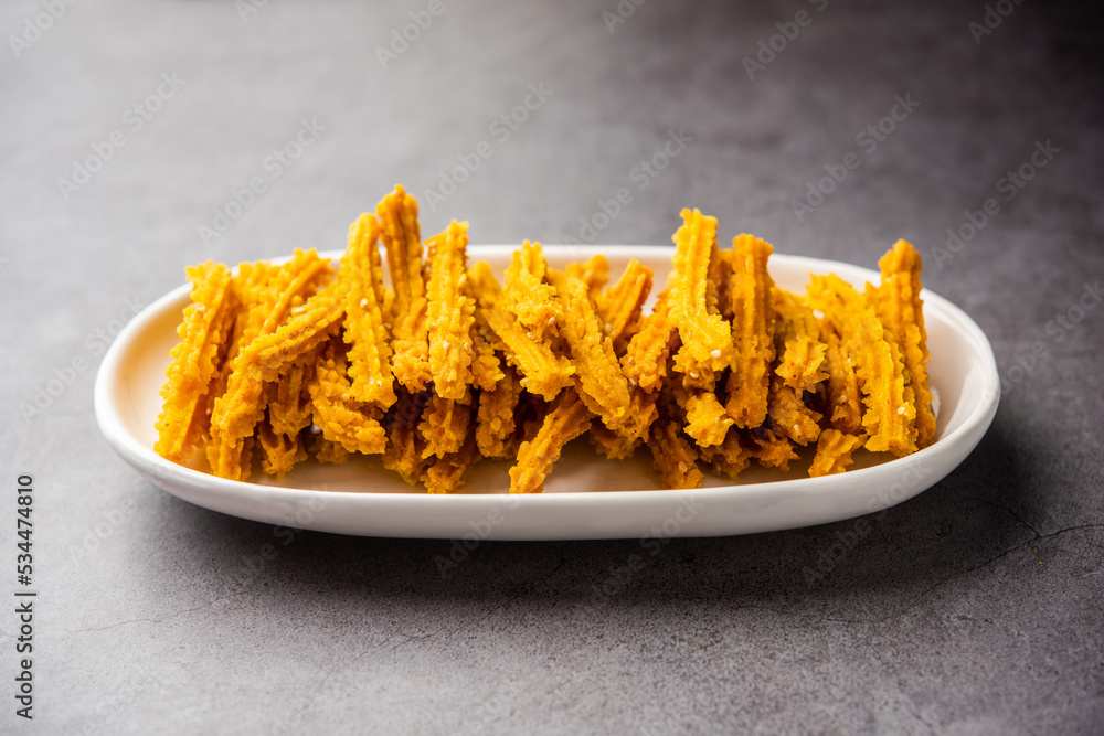 Bhajni chakli sticks or crunchy murukku snack made using diwali ...