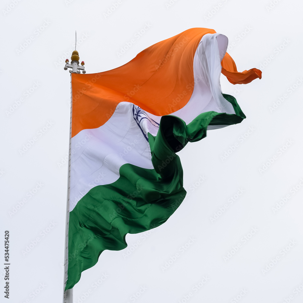 India flag flying high at Connaught Place with pride in blue sky, India ...