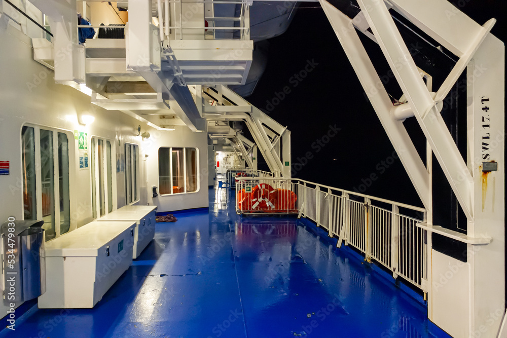 Outer corridor of the ship with the lifeboat and outer windows Stock ...