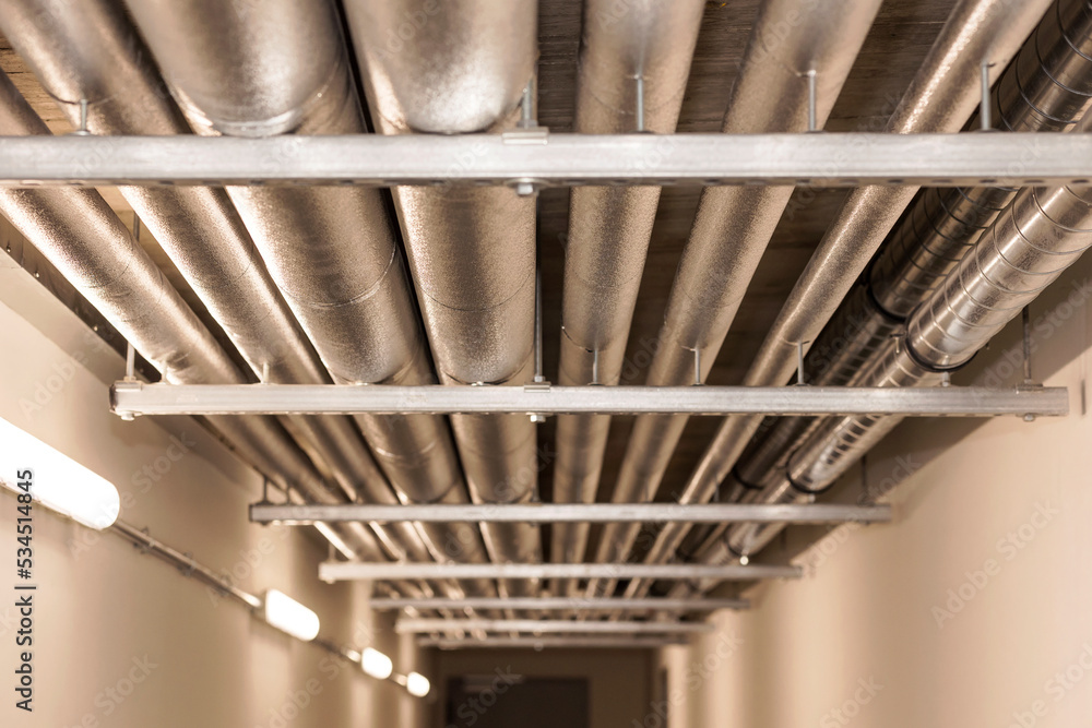 Ventilation and Sewerage Pipes on ceiling. Ventilation Ducted System ...