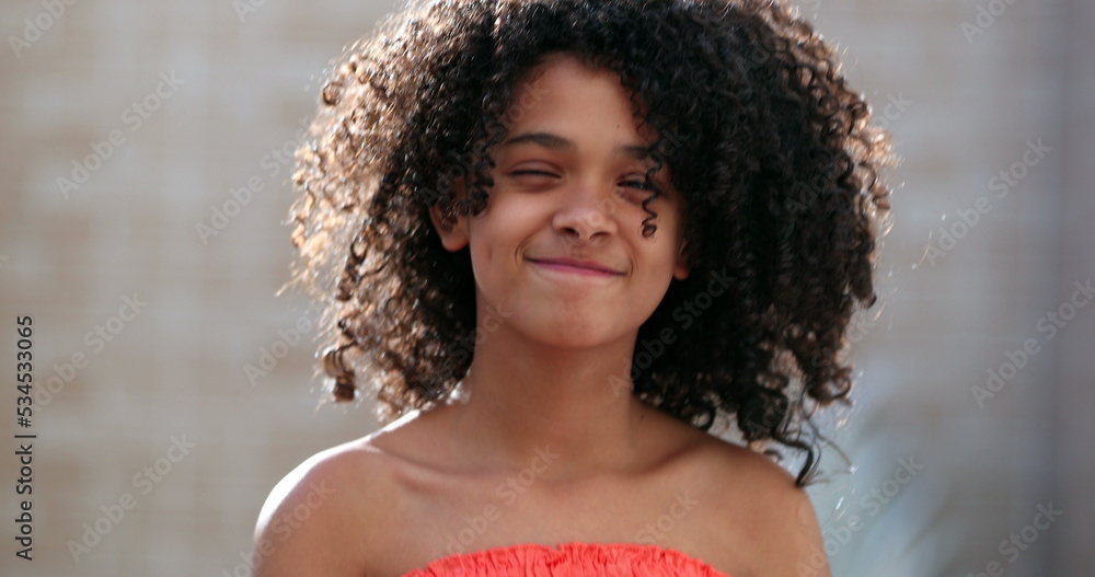 Happy mixed race preteen girl portrait face close-up Stock Photo ...