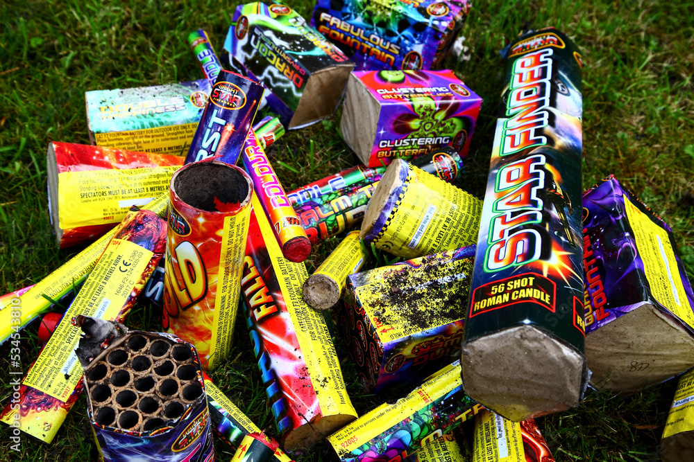 Heap of used burnt firework shells left over from a bonfire night ...