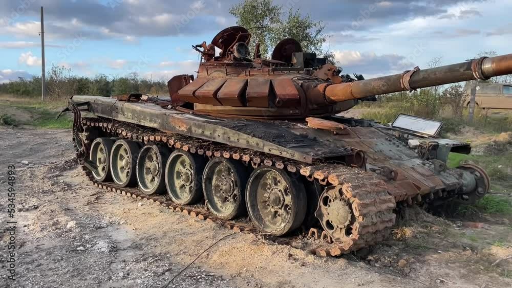 Destroyed Russian tank and war equipment along the road. Russia's ...