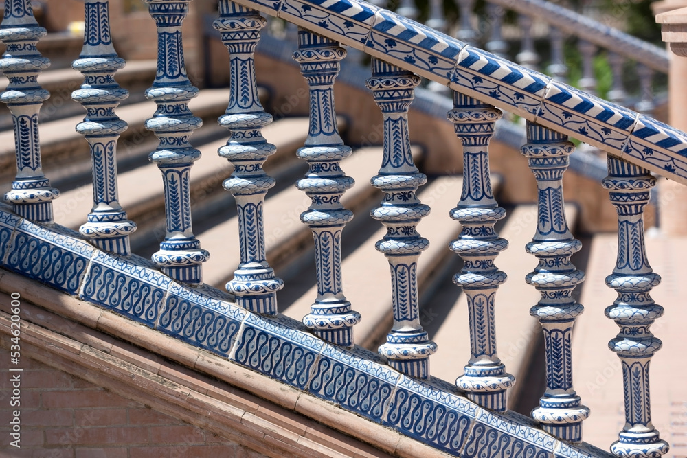 Beautiful andalusian ceramic balustrade foreground and blurred ...