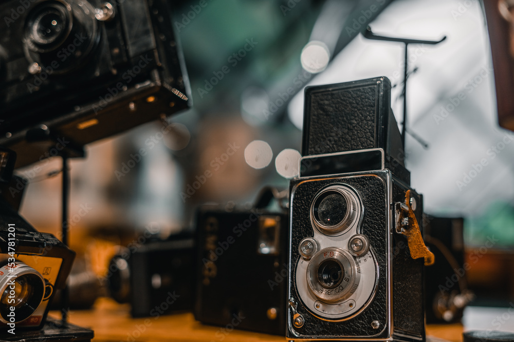 clean old cameras worn by the passing of the years carefully displayed ...