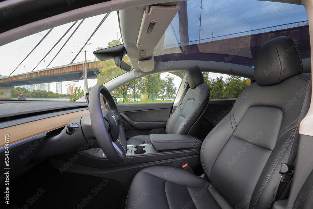 Driver's seat of the interior car Tesla Model Y Stock Photo | Adobe Stock