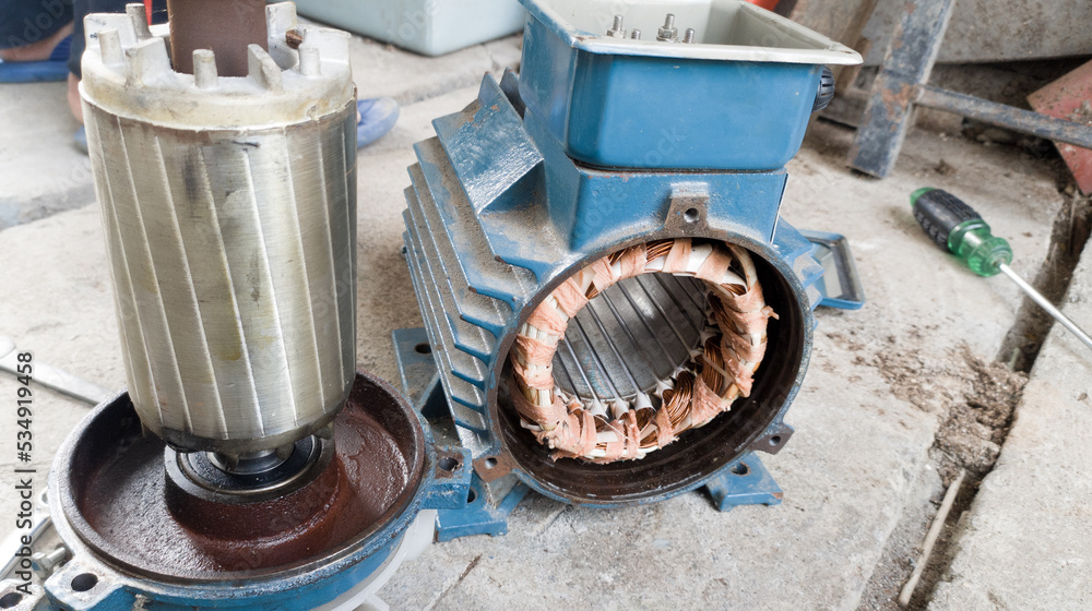 Disassemble three-phase electric motor, electric motor winding. Stock ...