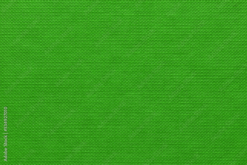 An extreme close-up of the cover of a vibrant lime green coloured ...