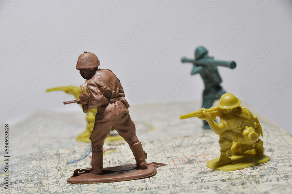 people are planning an attack on the map Stock Photo | Adobe Stock