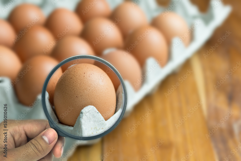 The concept of egg benefits,egg is placed on a paper box and are ...