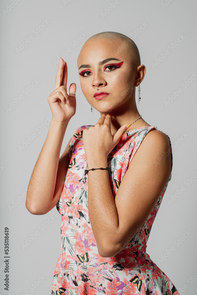 Hairless Colombian woman being vain and wearing makeup. portrait of a ...