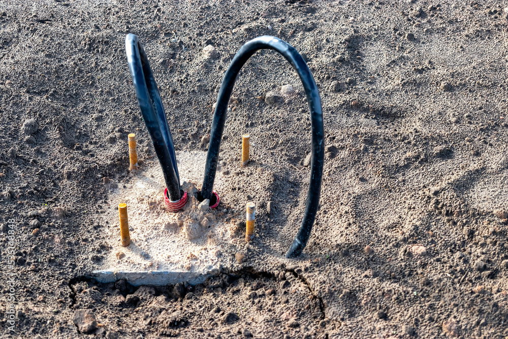 The ends of the electrical cable in the trench. electrical cable ...