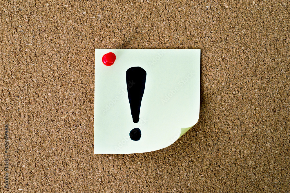 Note with exclamation mark pinned on a cork board Stock Photo | Adobe Stock