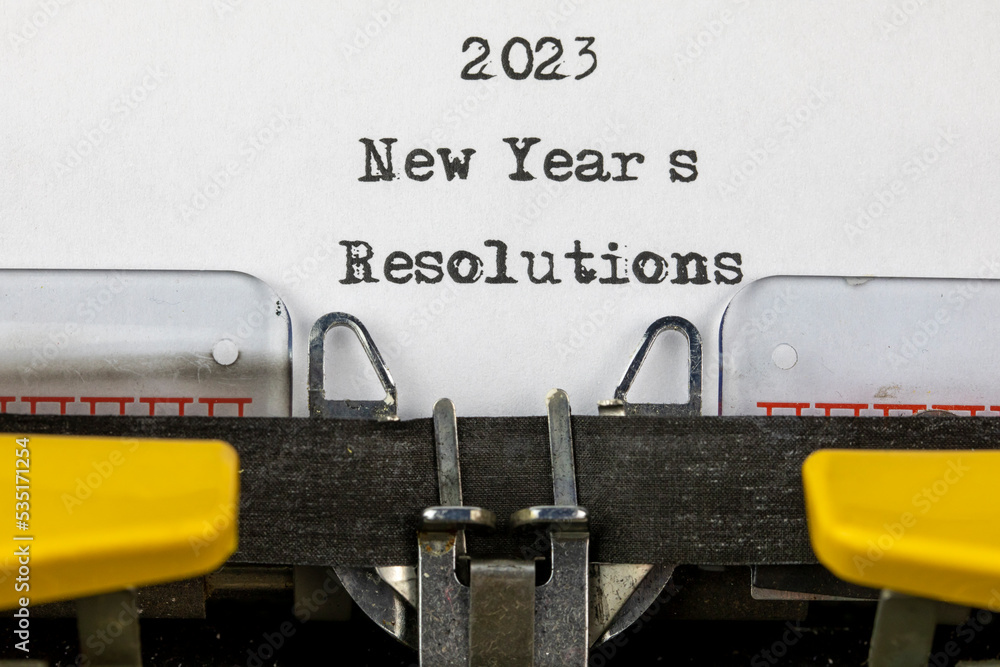 2023 New Years Resolutions written on an old typewriter Stock Photo ...